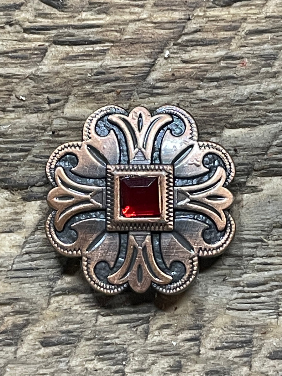 1” copper floral Concho with transparent red stone – High Desert Conchos
